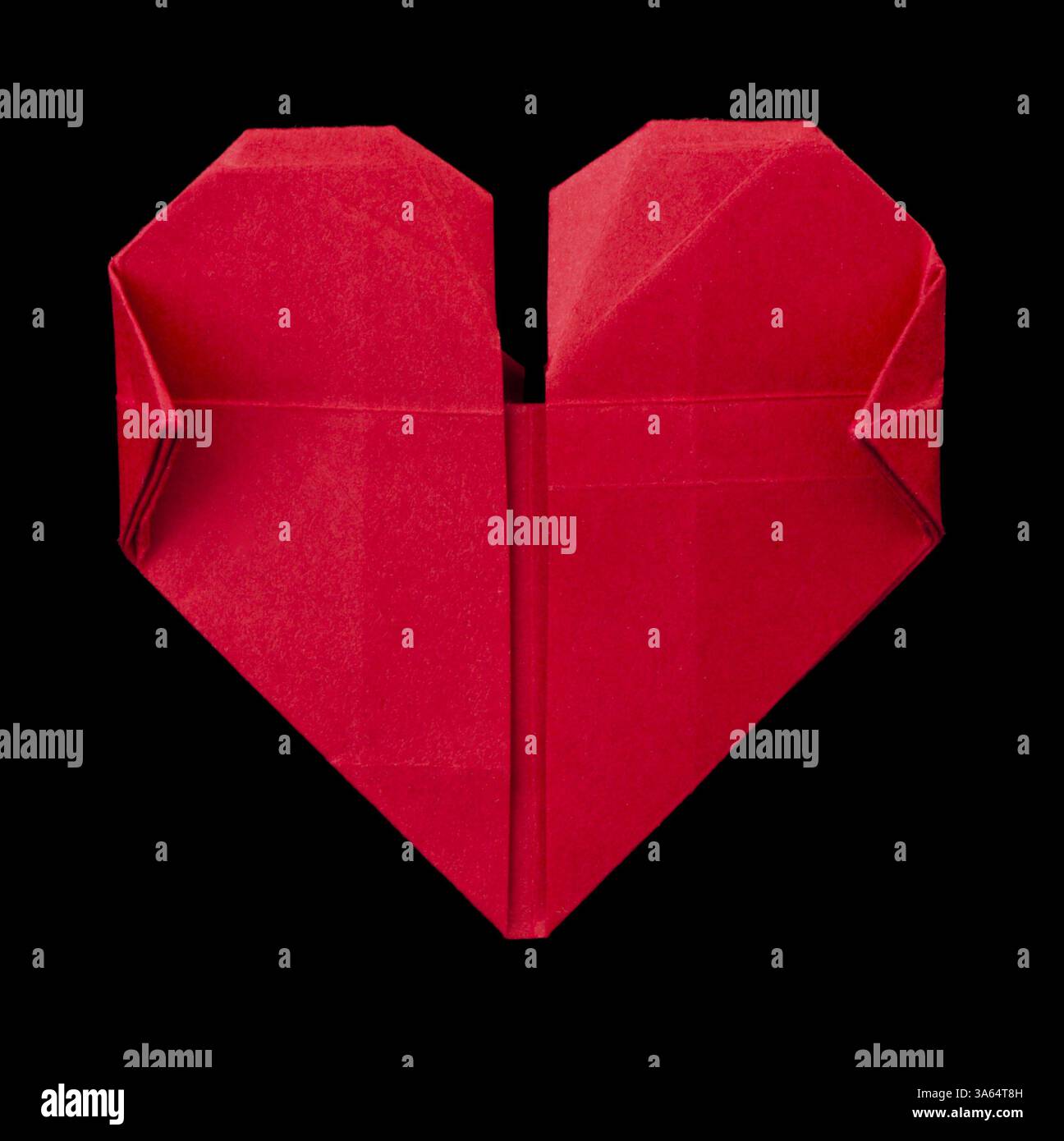 Origami red heart. Black isolated Stock Photo - Alamy