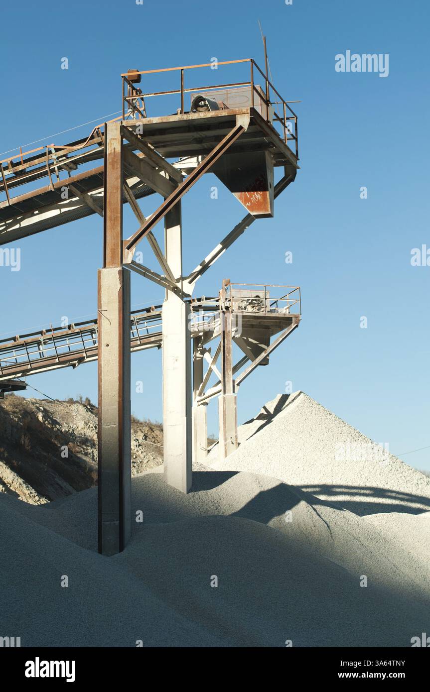 Machinery in a limestone quarry.Piles of limestone rocks Stock Photo ...