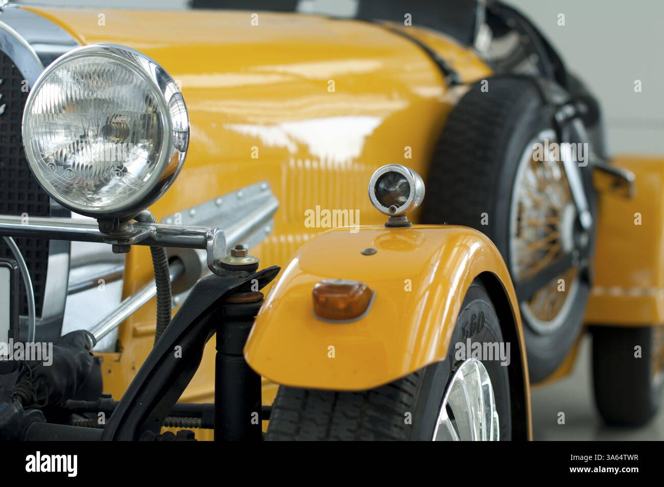 Yellow retro vehicle. Close Up details, car headlamp. Background car ...