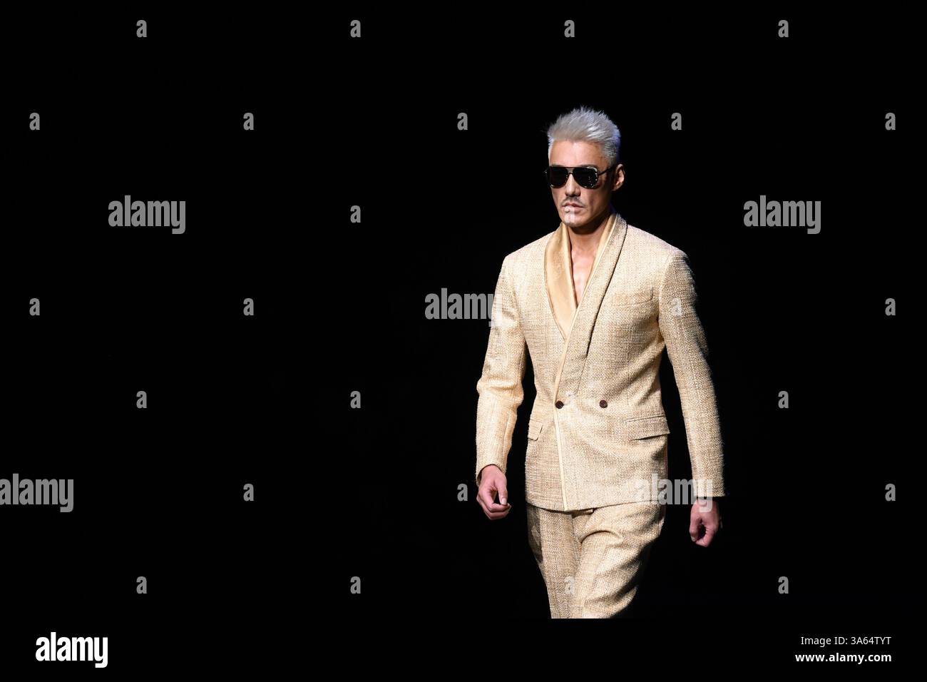Beijing,China.22th March 2025. Chinese model Hu Bing presents a ...