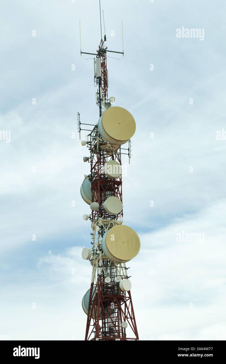 Radio transmitters and antennas. Blue sky Stock Photo - Alamy