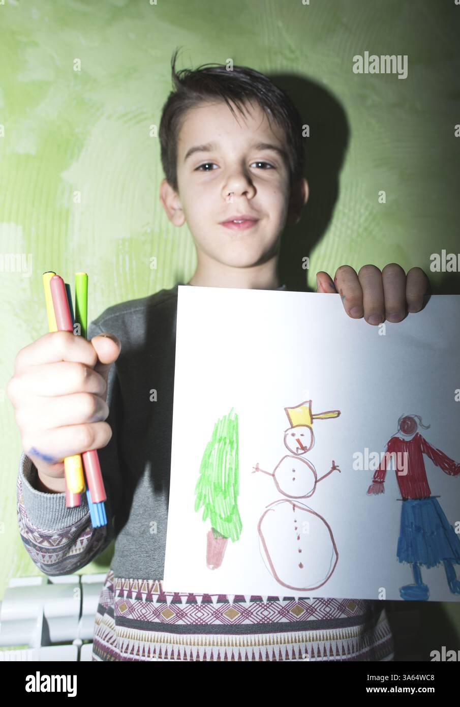 Child shows picture. Direct on camera flash Stock Photo - Alamy