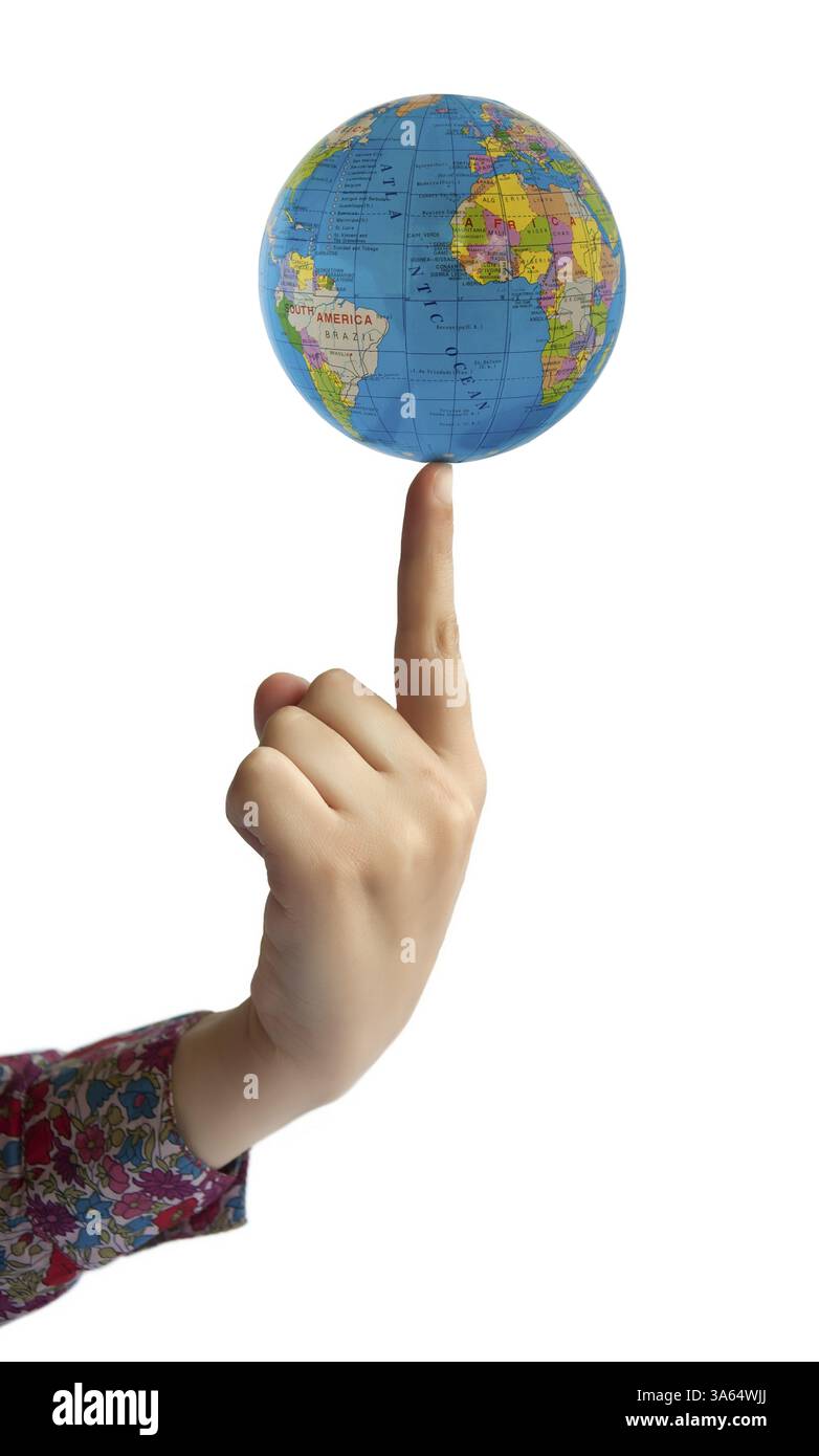 Hand holding globe on finger. Vertical image Stock Photo - Alamy