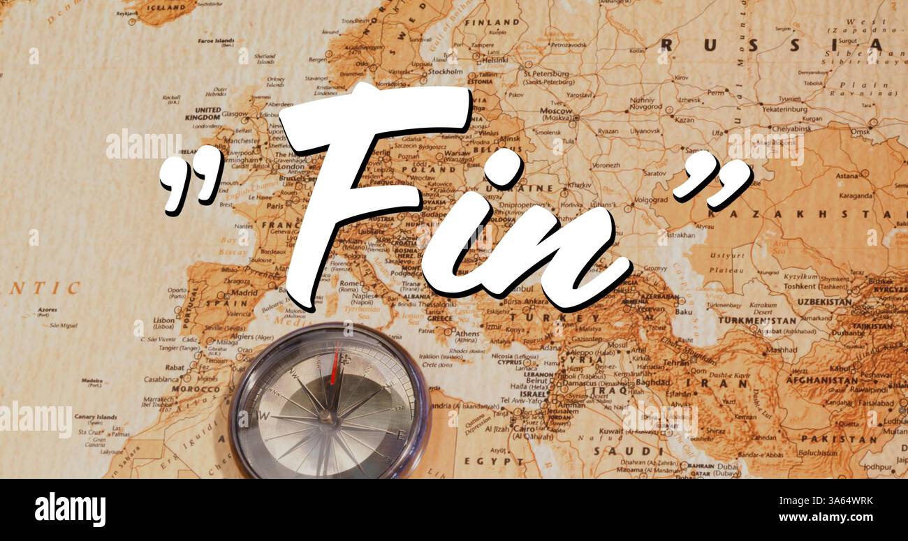 Compass resting on vintage map of Europe with Fin text overlay Stock ...