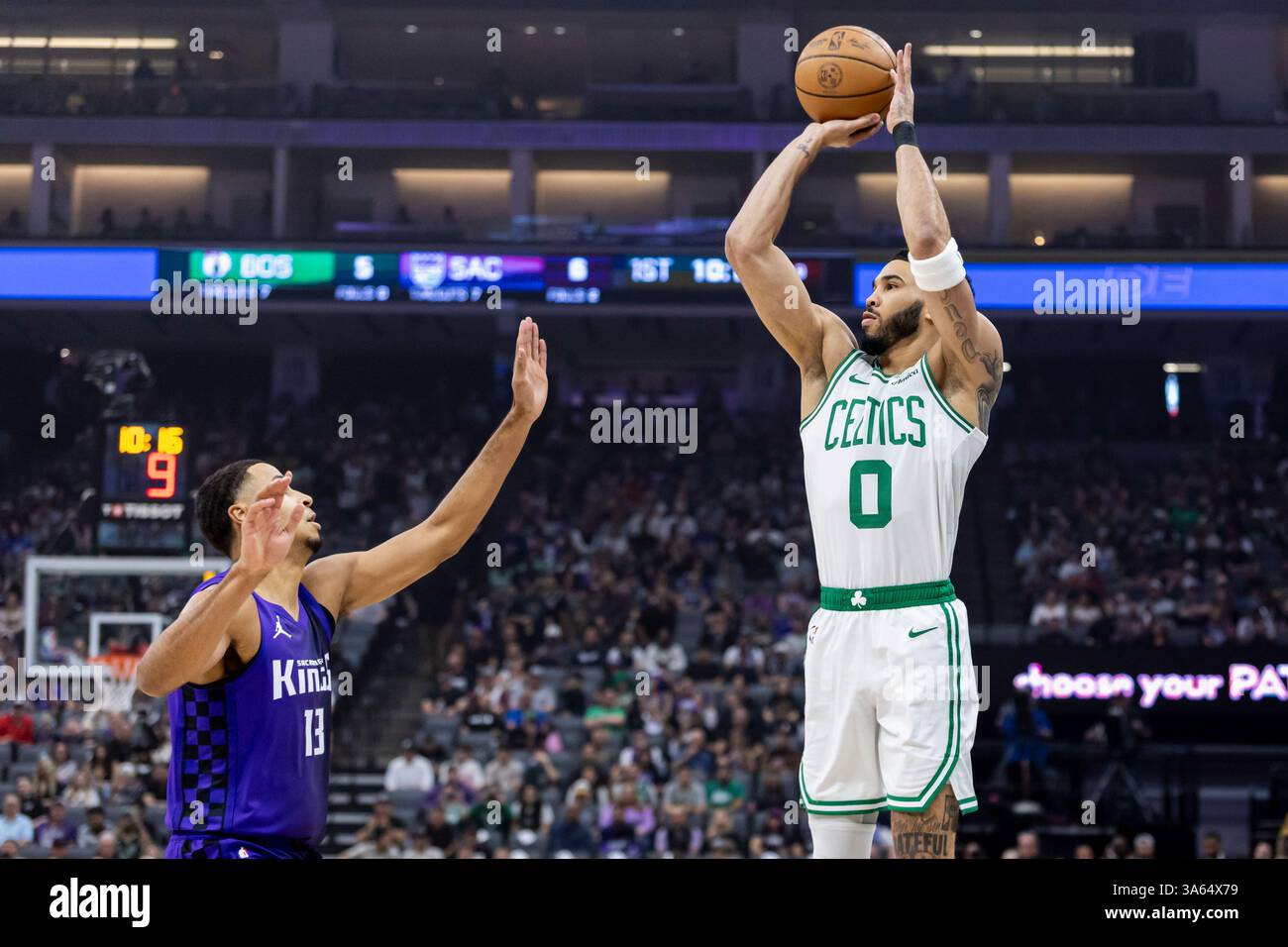 Boston Celtics forward Jayson Tatum (0) shoots a three-pointer over ...