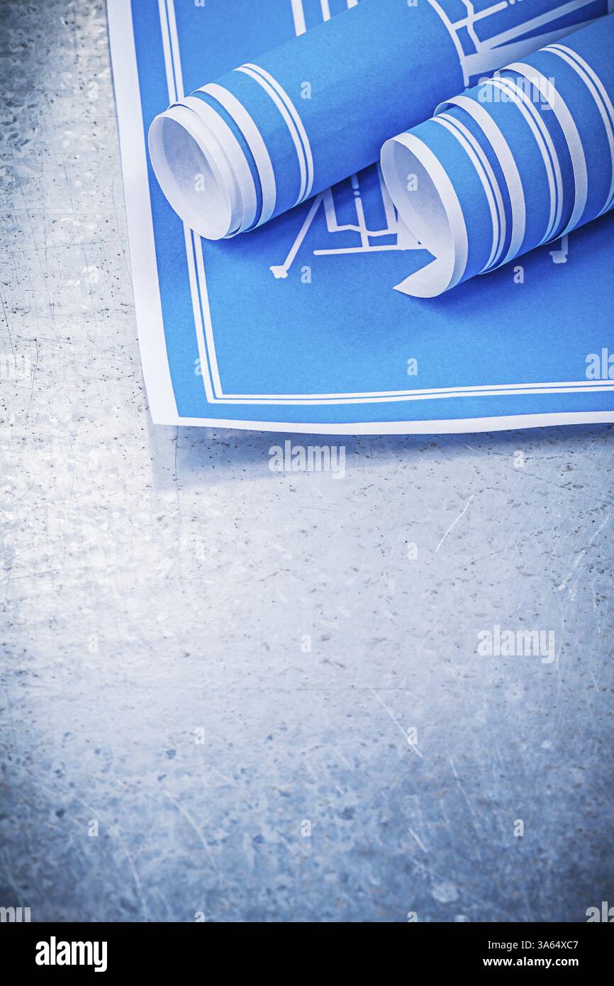 Composition of blue blueprints on metallic background construction ...
