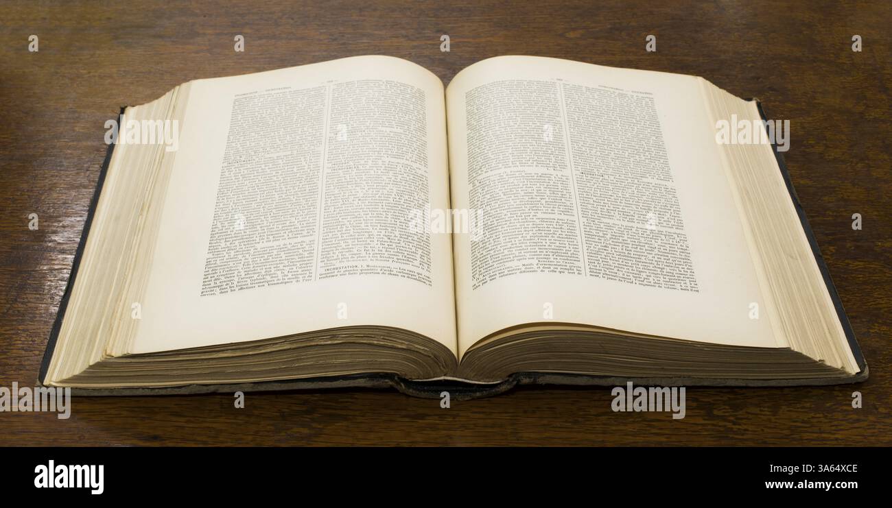 Open old big book. French encyclopedia Stock Photo - Alamy