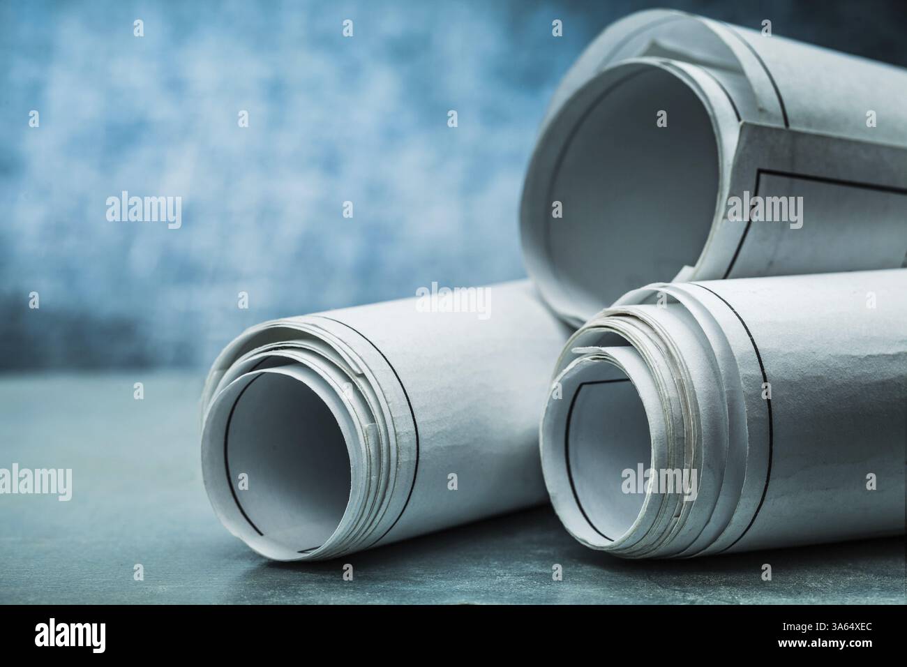 Very close up view on roled blueprint metalic background Stock Photo ...