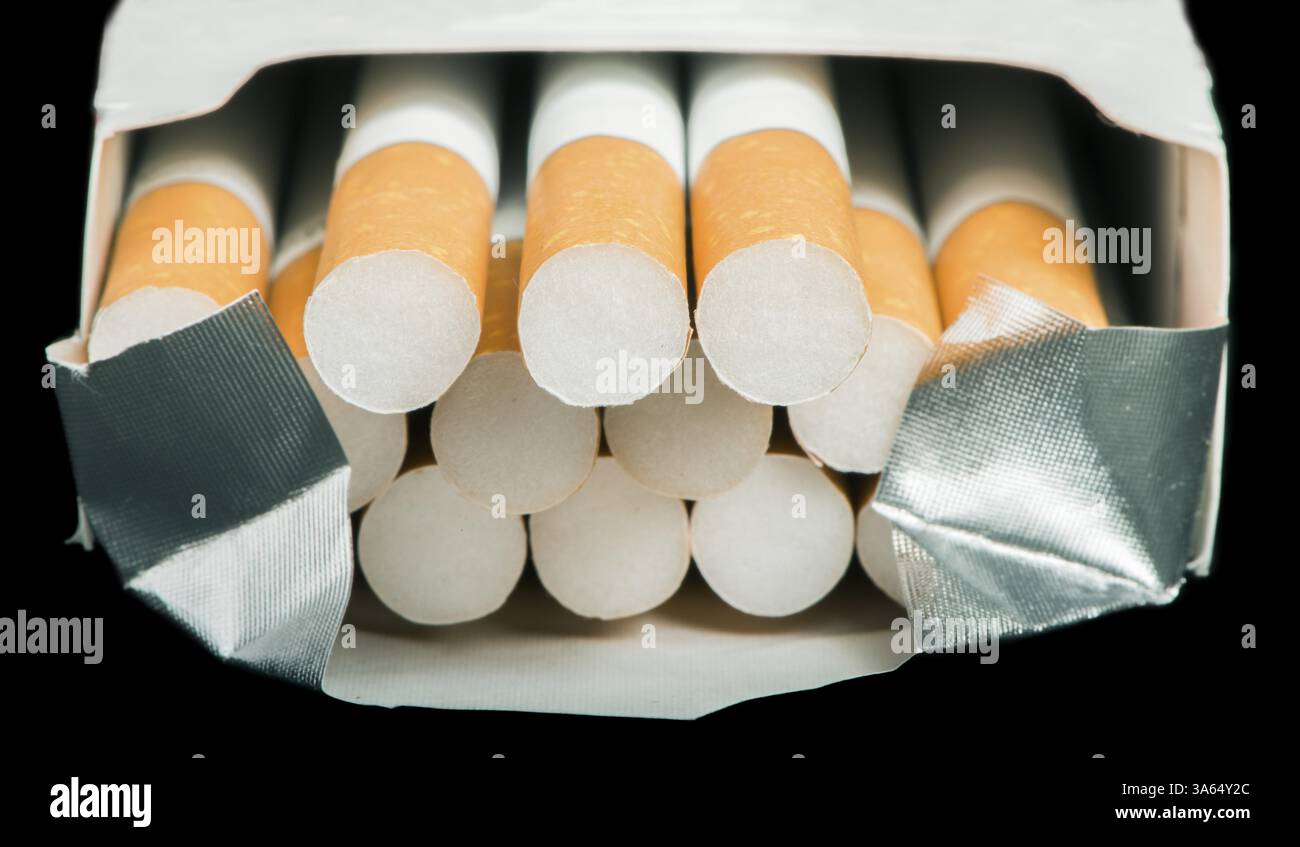 Box of cigarettes.Close up black isolated studio shot Stock Photo - Alamy