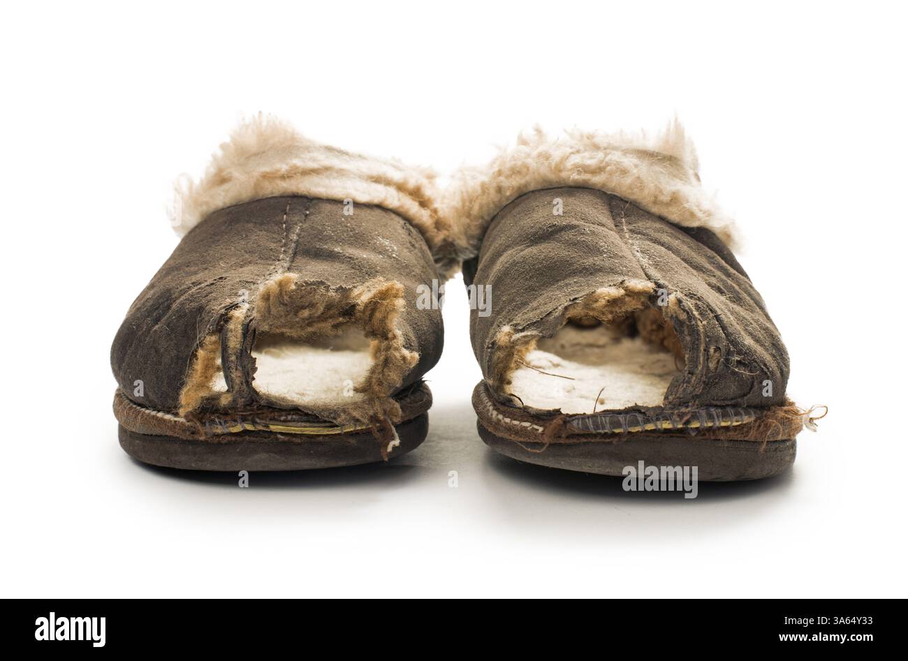 Old torn boots of leather with a hole Stock Photo - Alamy