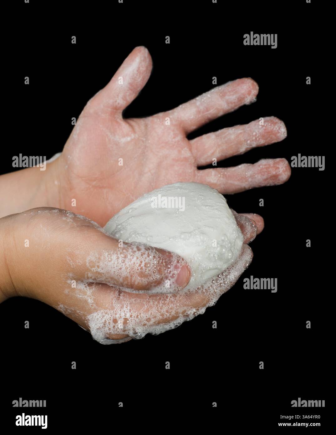 Isolated lathered hands and soap Stock Photo - Alamy