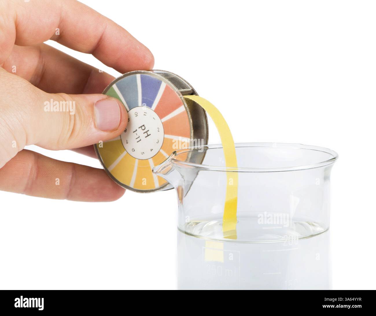 Litmus paper and beaker. Hand holding litmus paper Stock Photo - Alamy