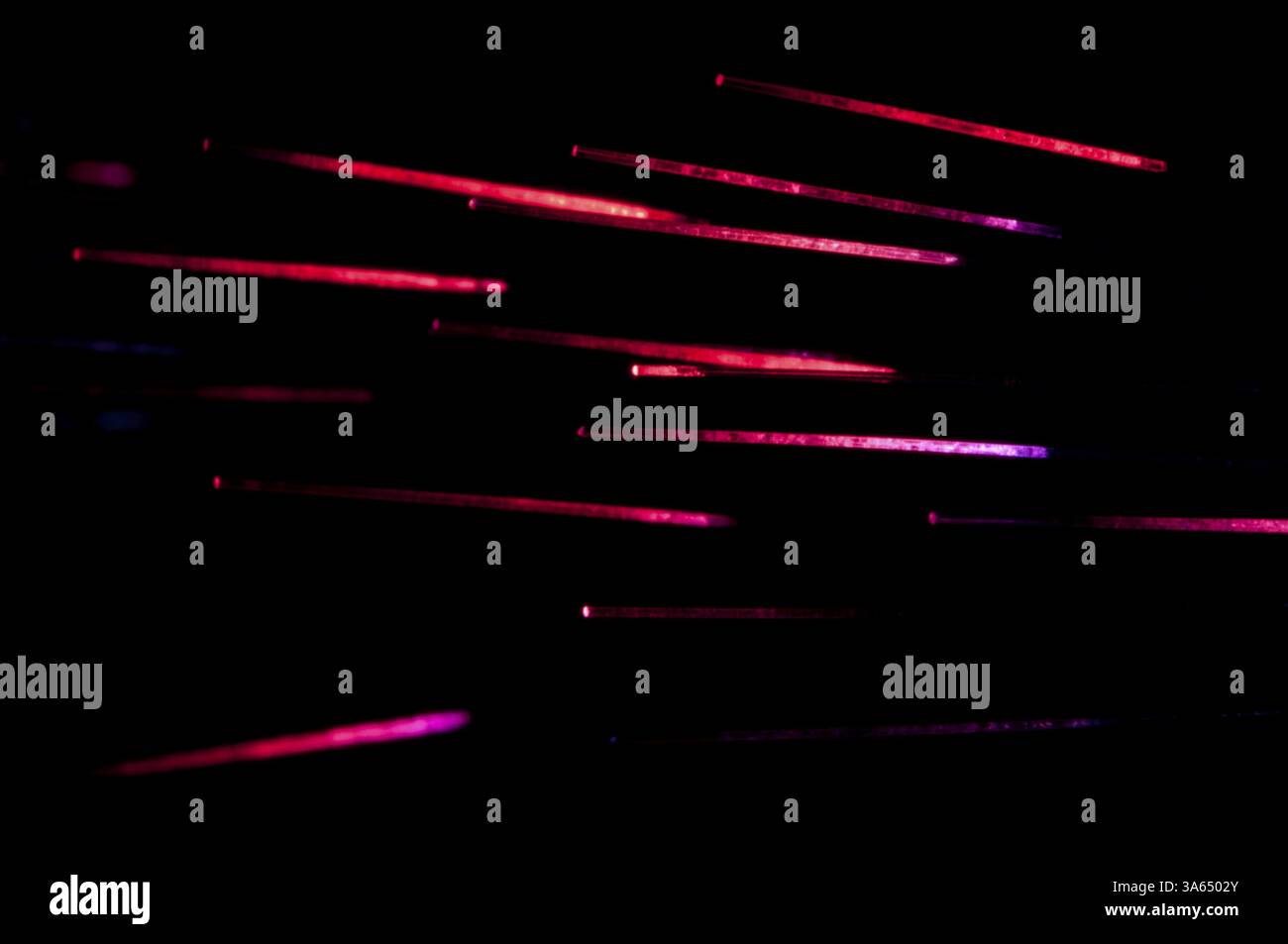 Red colors optical fibers Stock Photo - Alamy