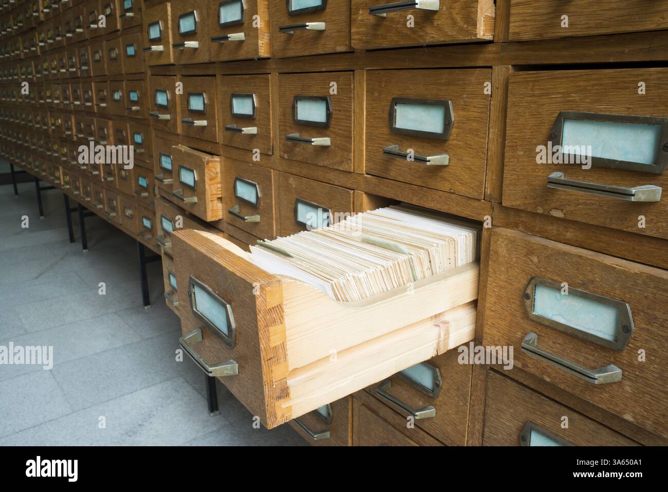Old archive with wooden drawers Stock Photo - Alamy