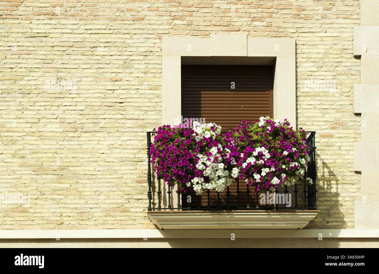 Classic balcony with flowers Stock Photo - Alamy