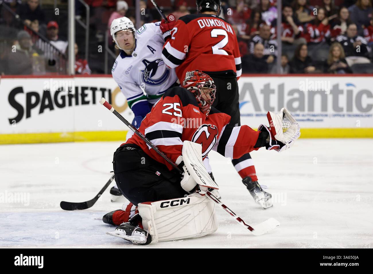 New Jersey Devils goaltender Jacob Markstrom (25) makes a save during ...
