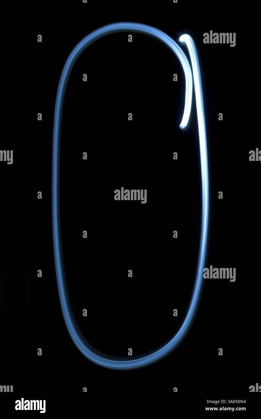 Number zero digit from natural neon light Stock Photo - Alamy