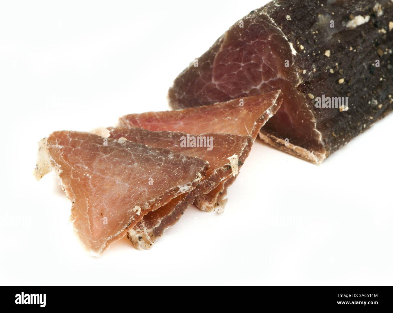 Homemade natural veal dried meat. White background Stock Photo - Alamy