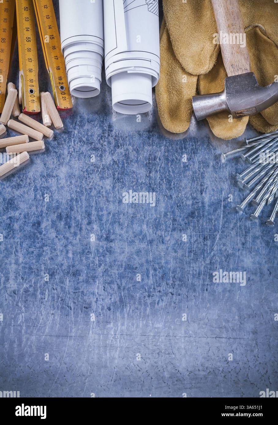Blueprint rolls claw hammer safety gloves wooden meter steel nails and ...
