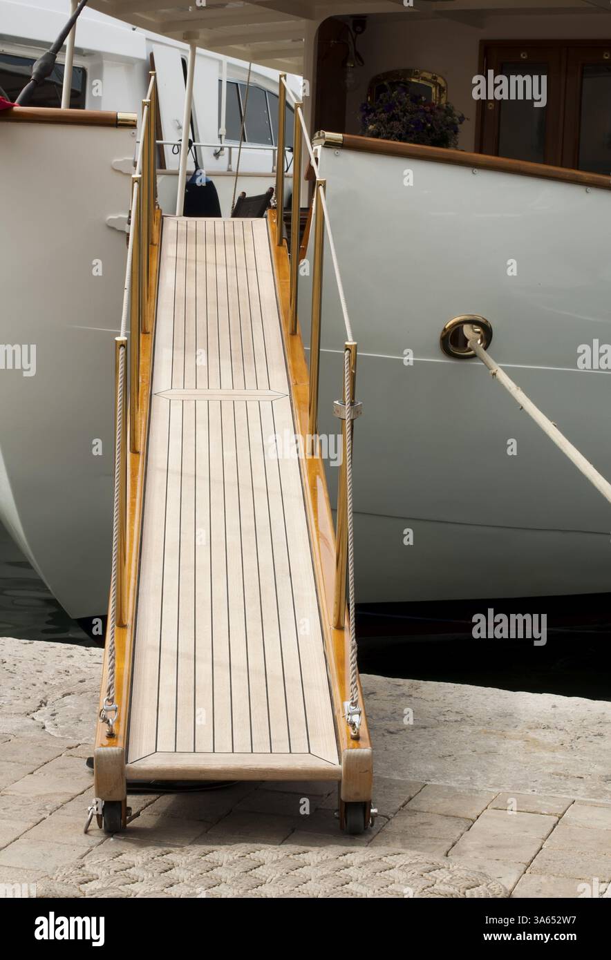 Yacht boarding ladder with rotating platform Stock Photo - Alamy