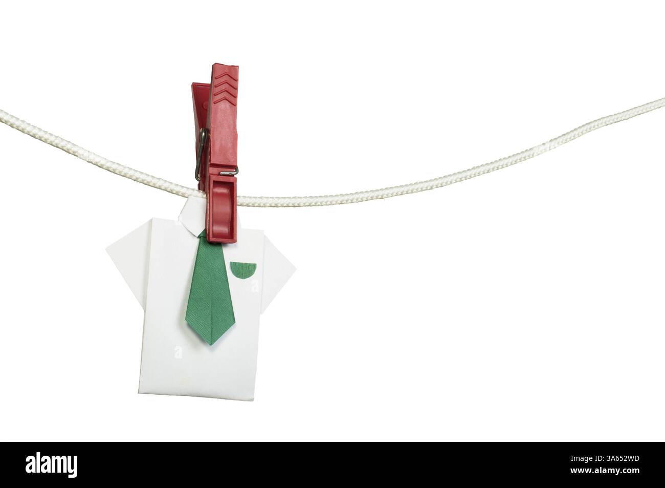 Origami shirt on rope. White isolated Stock Photo - Alamy