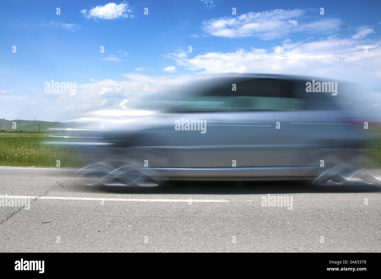 High speed blurred car on blue sky Stock Photo - Alamy