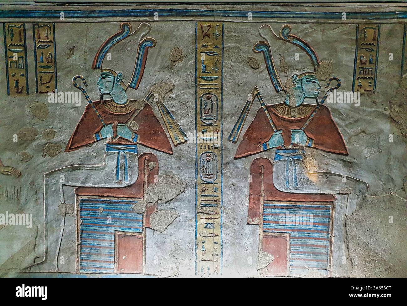 Close up of symmetrical relief images of Osiris receiving offerings ...