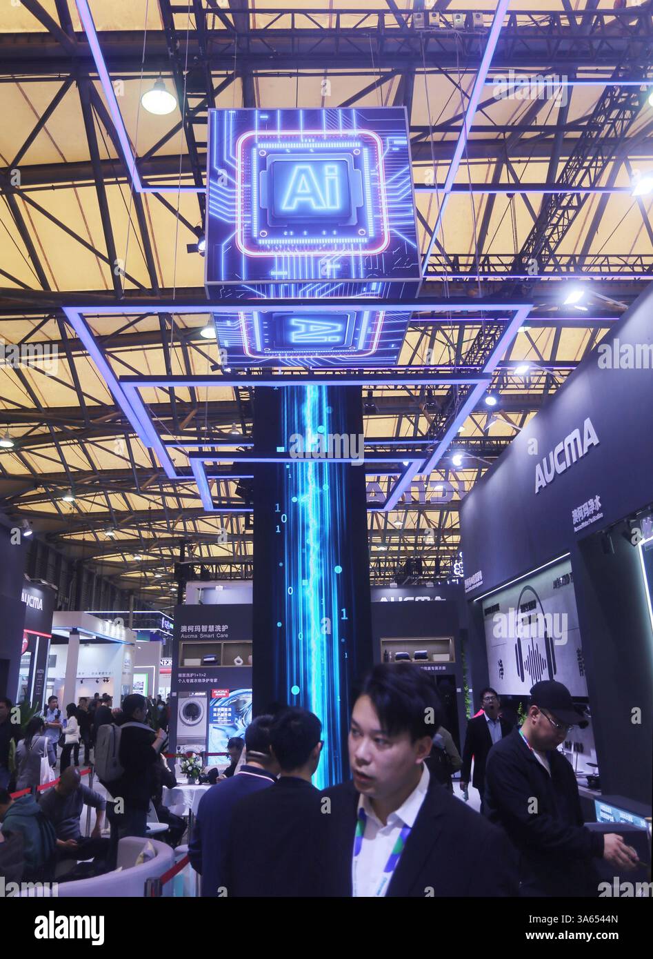 SHANGHAI, CHINA - MARCH 20, 2025 - Visitors visit the AUCMA AI ...
