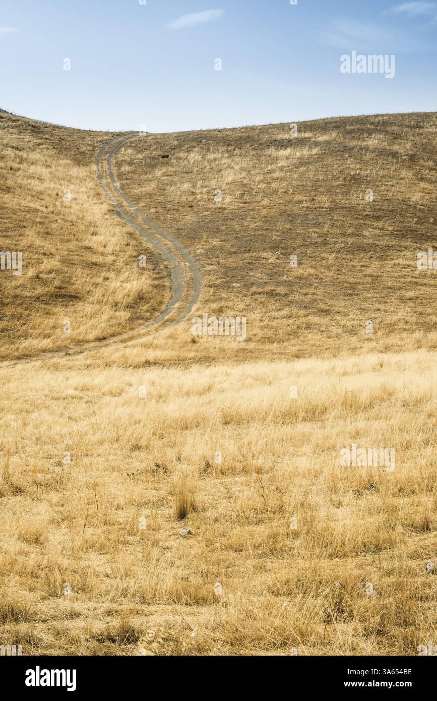Vintage dirt road and blue sky Stock Photo - Alamy