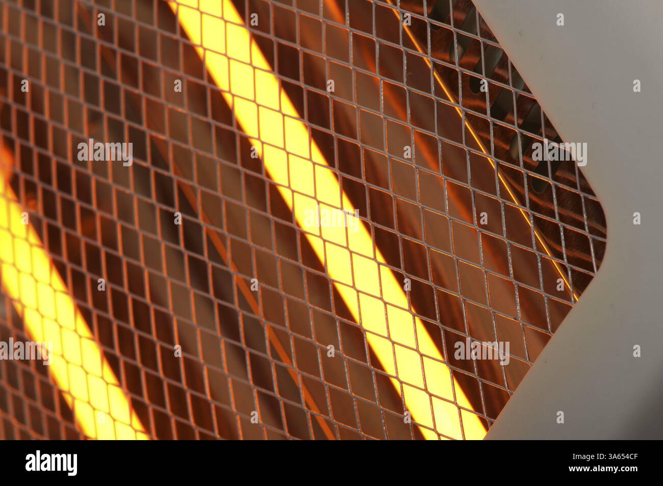 Electric heater with halogen coils close up. Luminous halogen coils ...