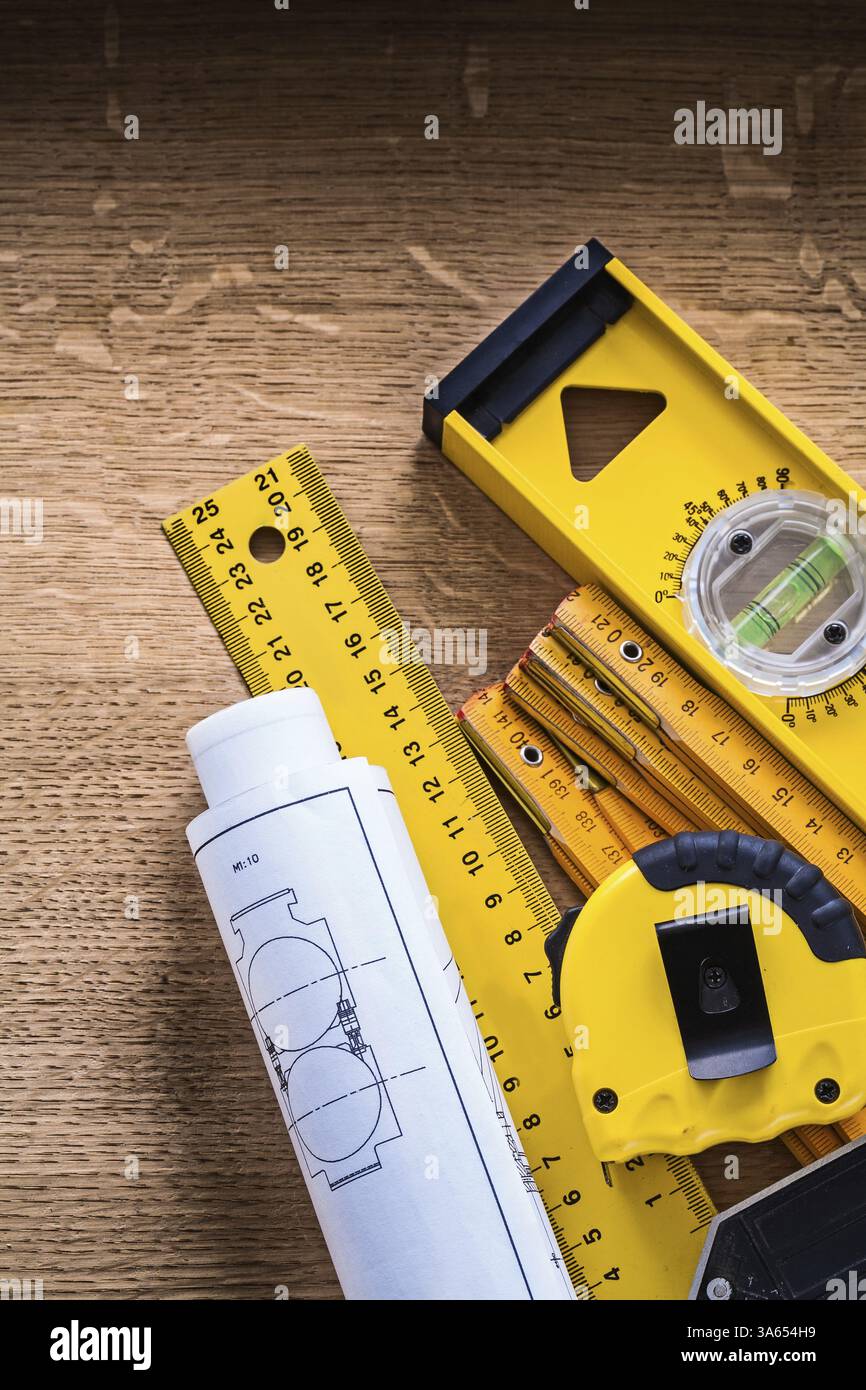 Blueprints and collection of instruments of measurement on oak wood ...