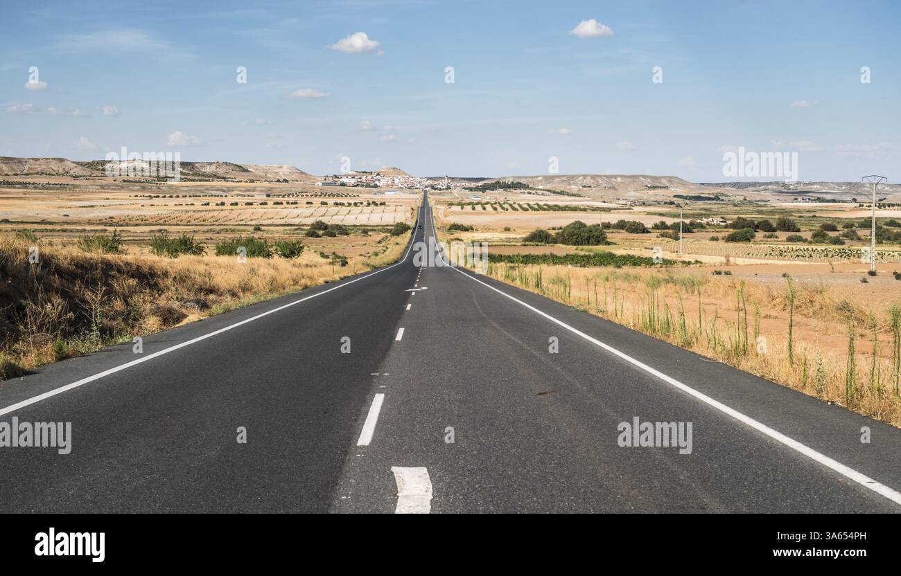 Long asphalt road and blue sky Stock Photo - Alamy