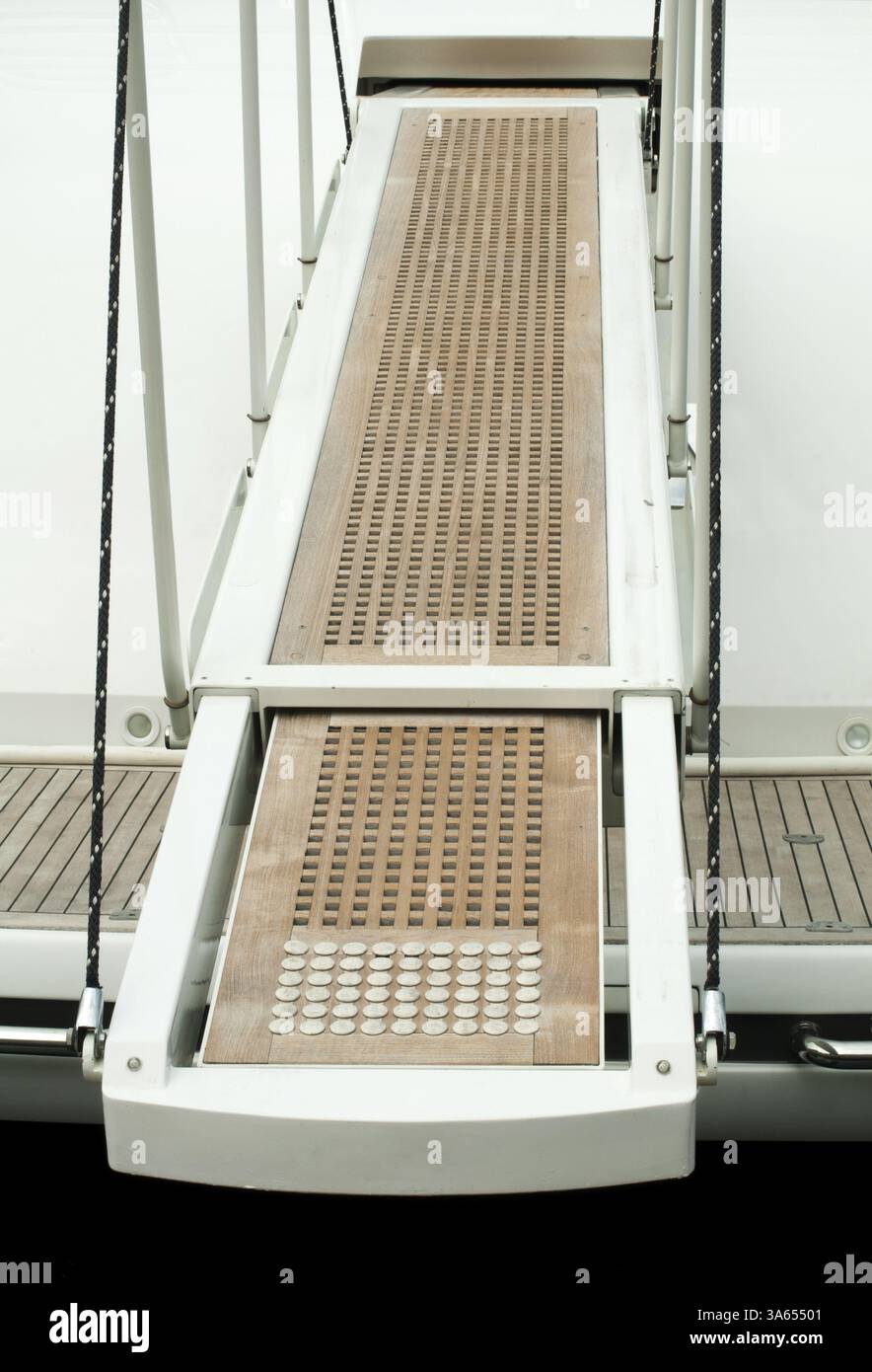Yacht boarding ladder with rotating platform Stock Photo - Alamy
