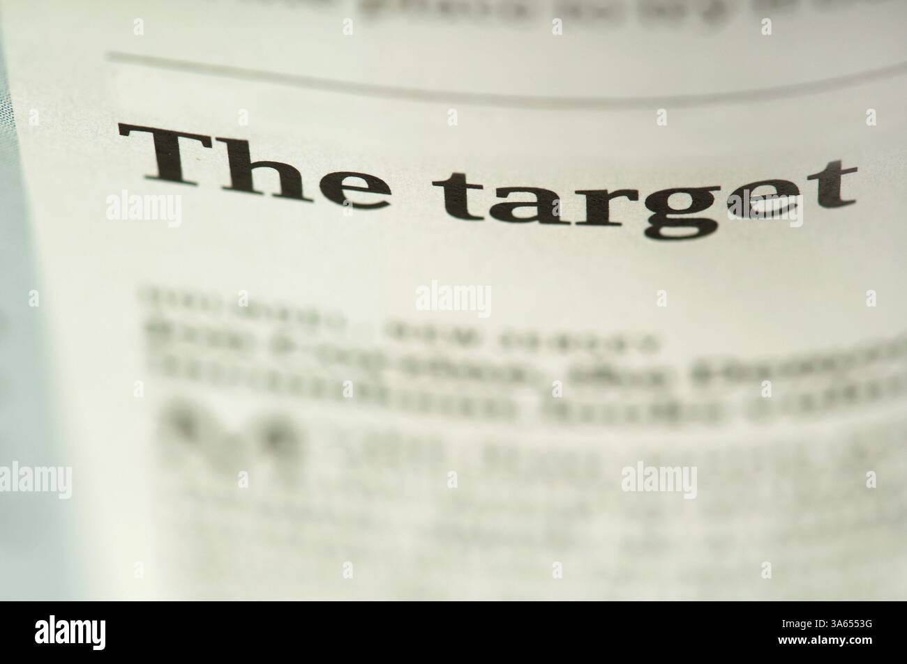 Word The target on newspaper Stock Photo - Alamy