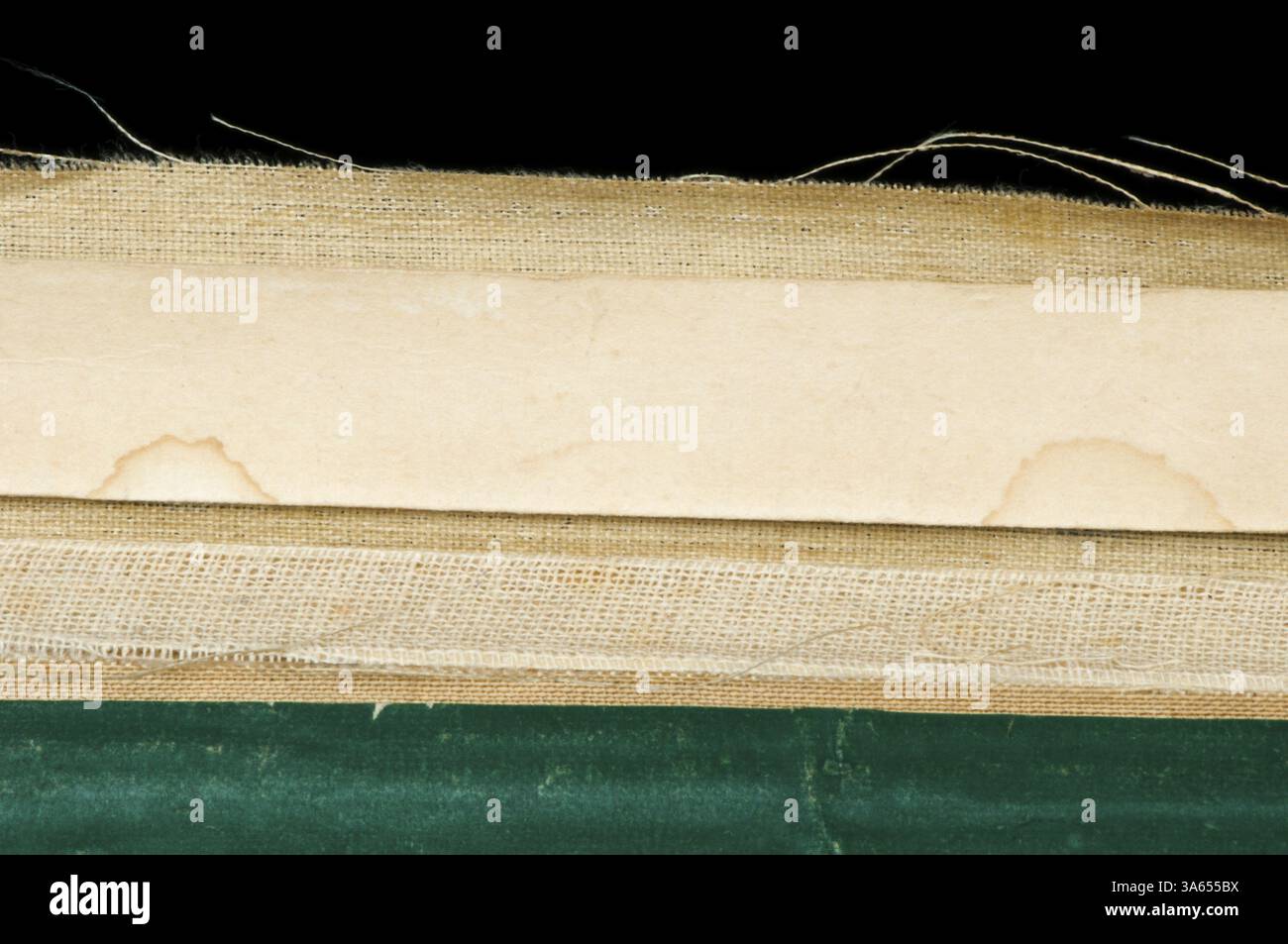 Old tattered book cover Stock Photo - Alamy