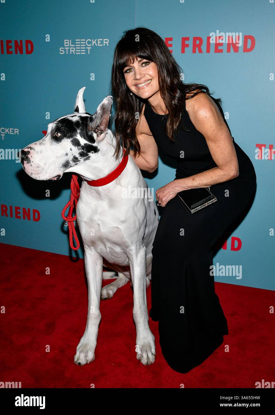 Carla Gugino, left, and Bing the dog attend the premiere of "The Friend ...