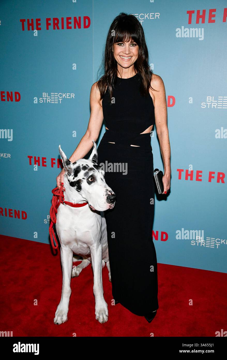 Carla Gugino, left, and Bing the dog attend the premiere of "The Friend ...