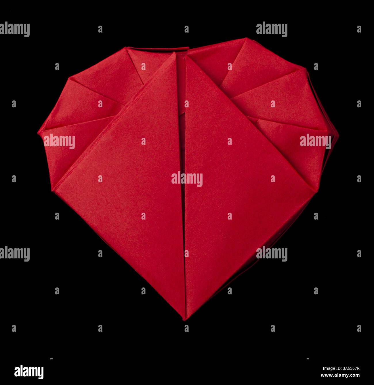Origami red heart. Black isolated Stock Photo - Alamy
