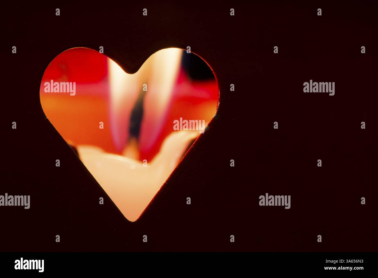 Candles and red heart shapes Stock Photo - Alamy
