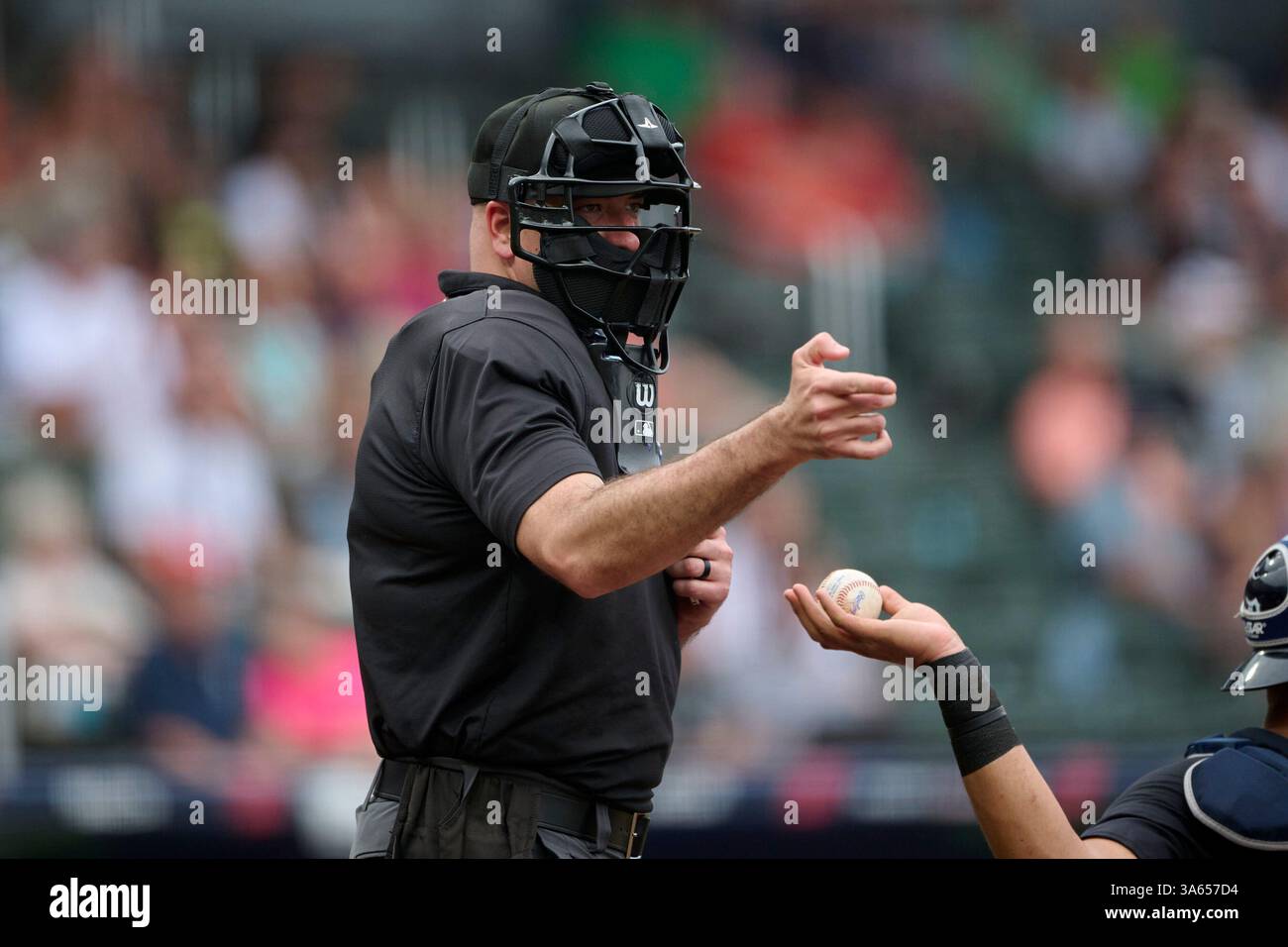 Umpire Thomas O'Neil calls a strike during an MLB Spring Breakout game ...
