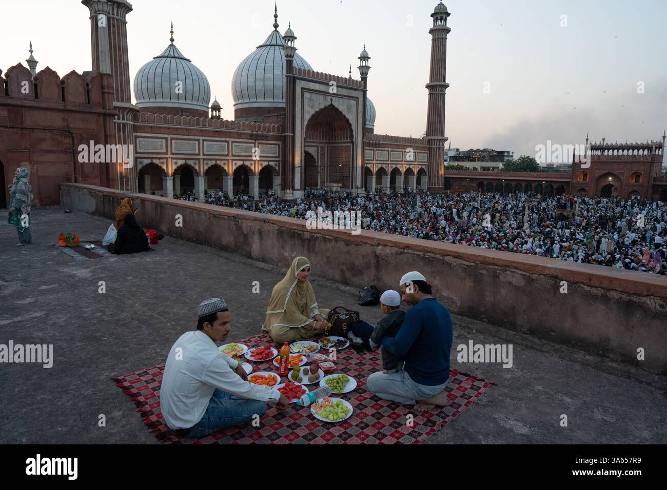 New Delhi, India. 23rd Mar, 2025. Indian Muslims gather to break their ...