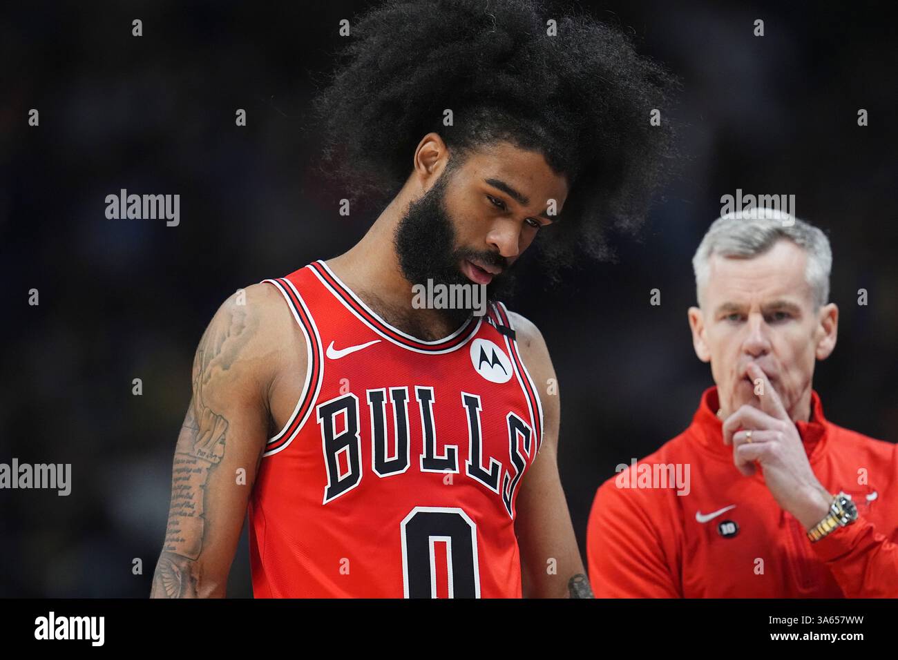 Chicago Bulls guard Coby White, left, confers with head coach Billy ...