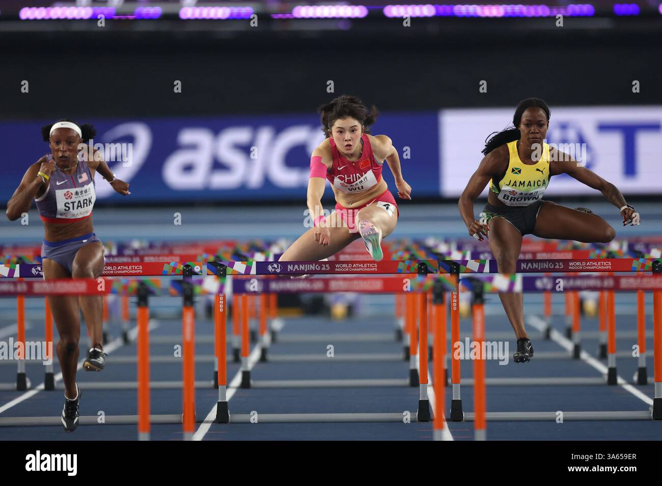 Nanjing,China.23th March 2025. Wu Yanni of China advances to the women ...