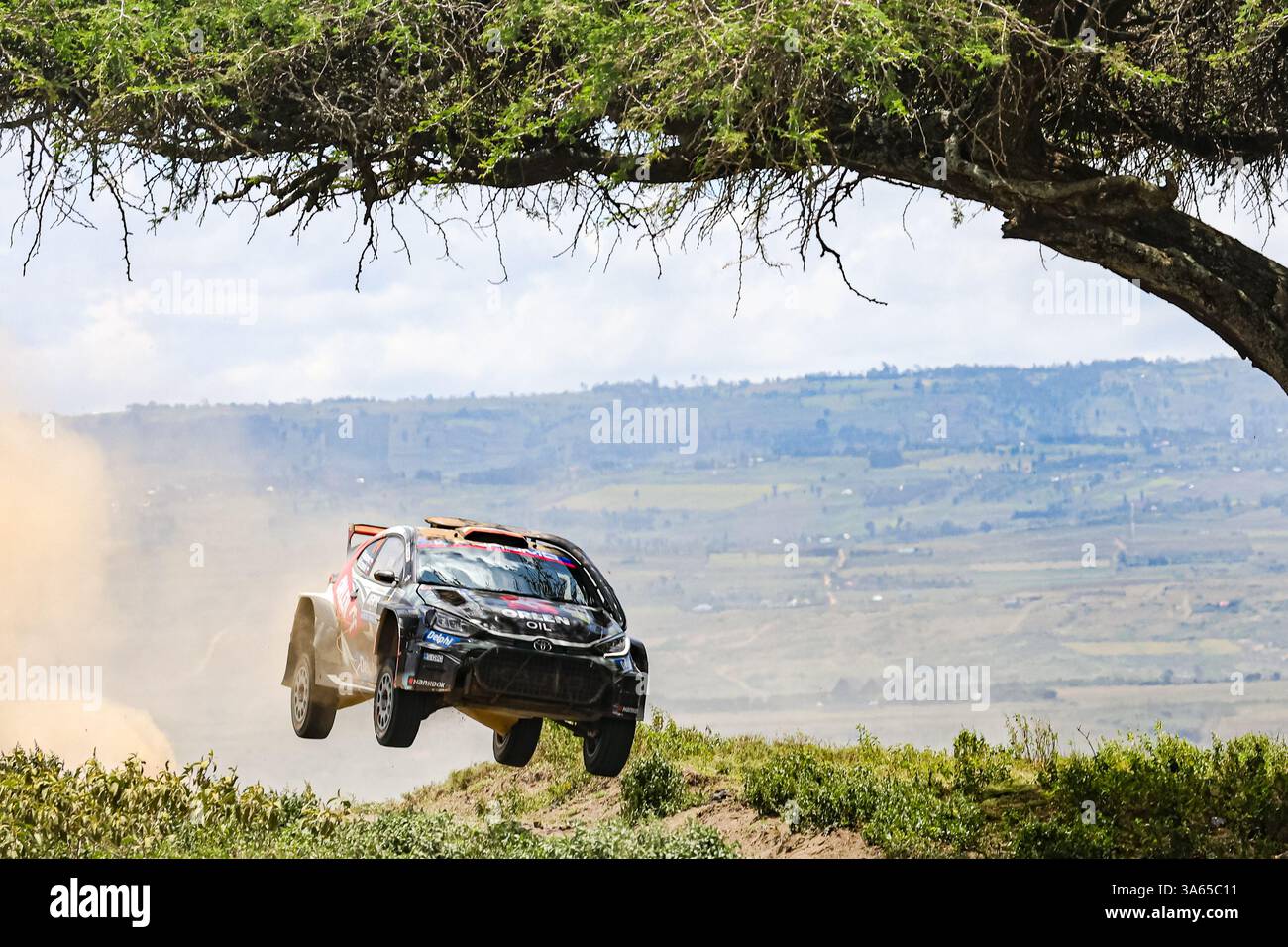 Naivasha, Kenya. 21st Mar, 2025. A photo of a rally over a jump at Miti ...