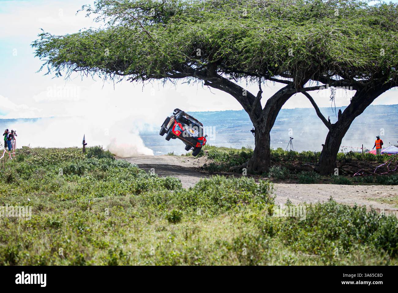 A photo of a rally over a jump at Miti-Mbili Kedong 1. Safari Rally ...