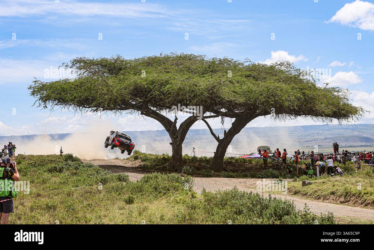 A photo of a rally over a jump at Miti-Mbili Kedong 1. Safari Rally ...