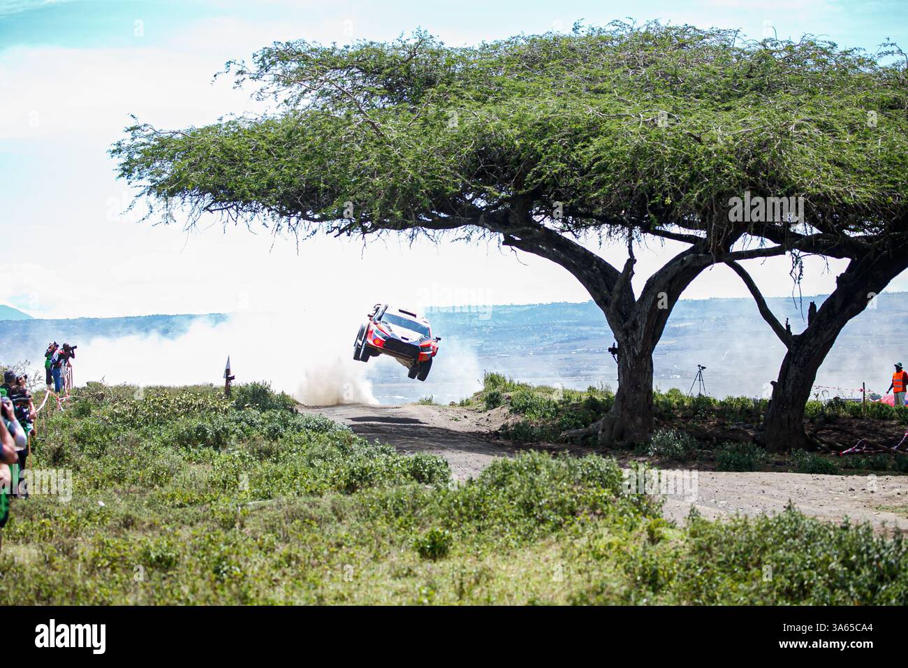 A photo of a rally over a jump at Miti-Mbili Kedong 1. Safari Rally ...