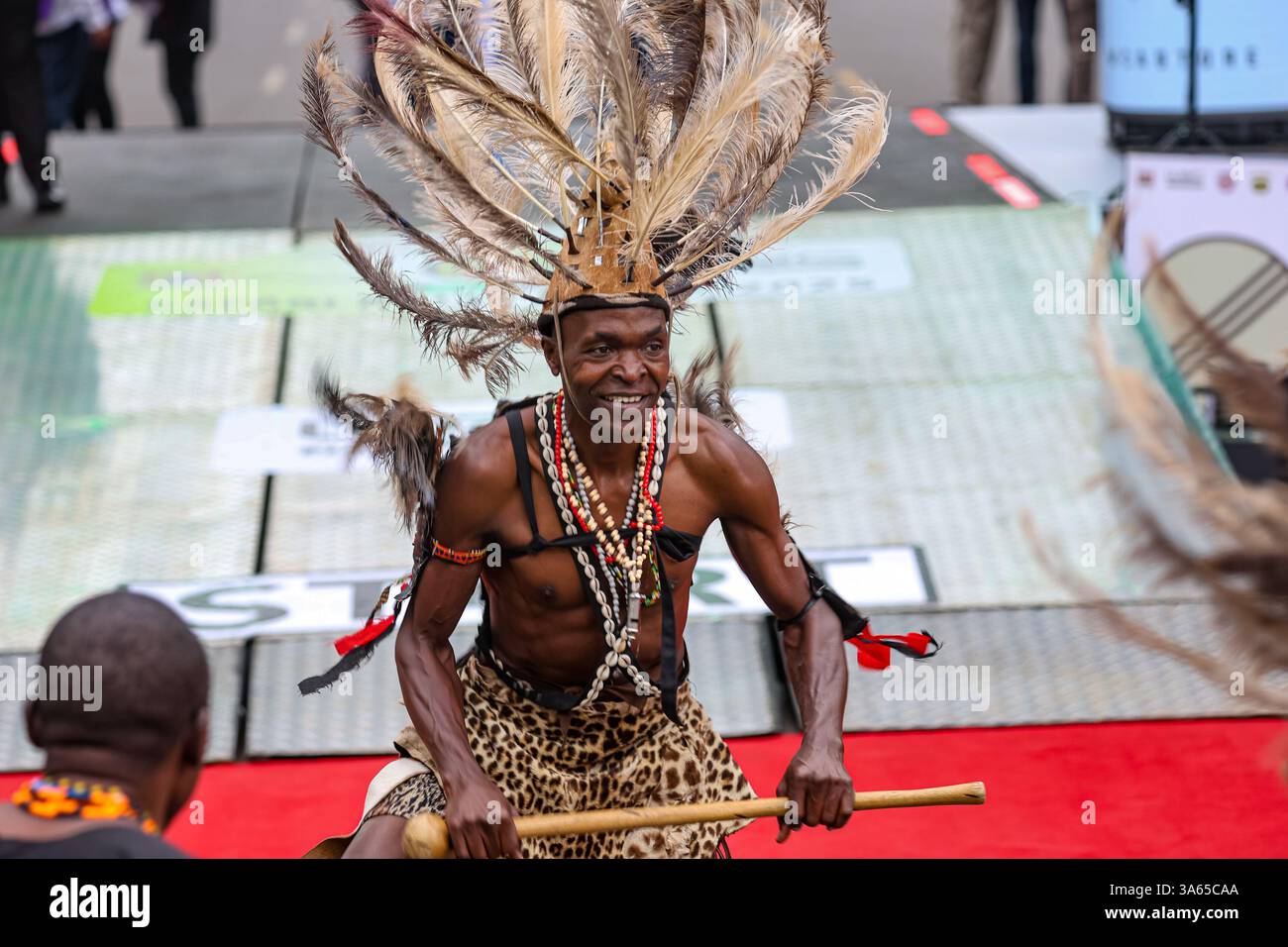 A member of Bomas of Kenya traditional dancers entertains guests during ...