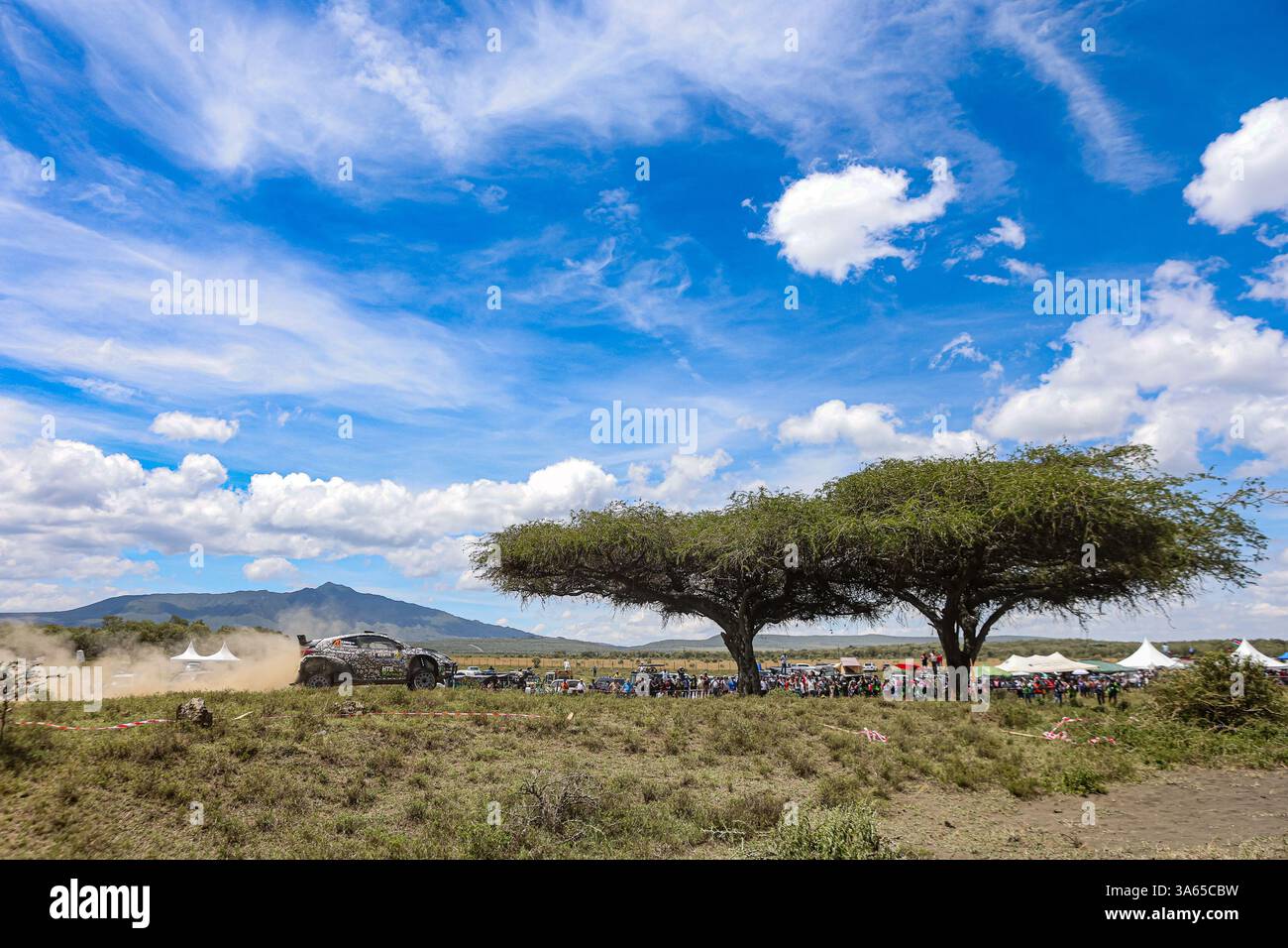 Kenyan driver Hamza Anwar speeds off his Ford Fiesta R5 do a jump at ...