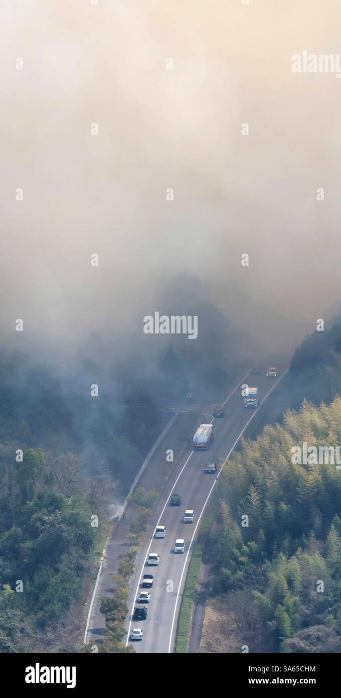 An aerial photo shows a spreading forest fire in Imabari, Ehime ...